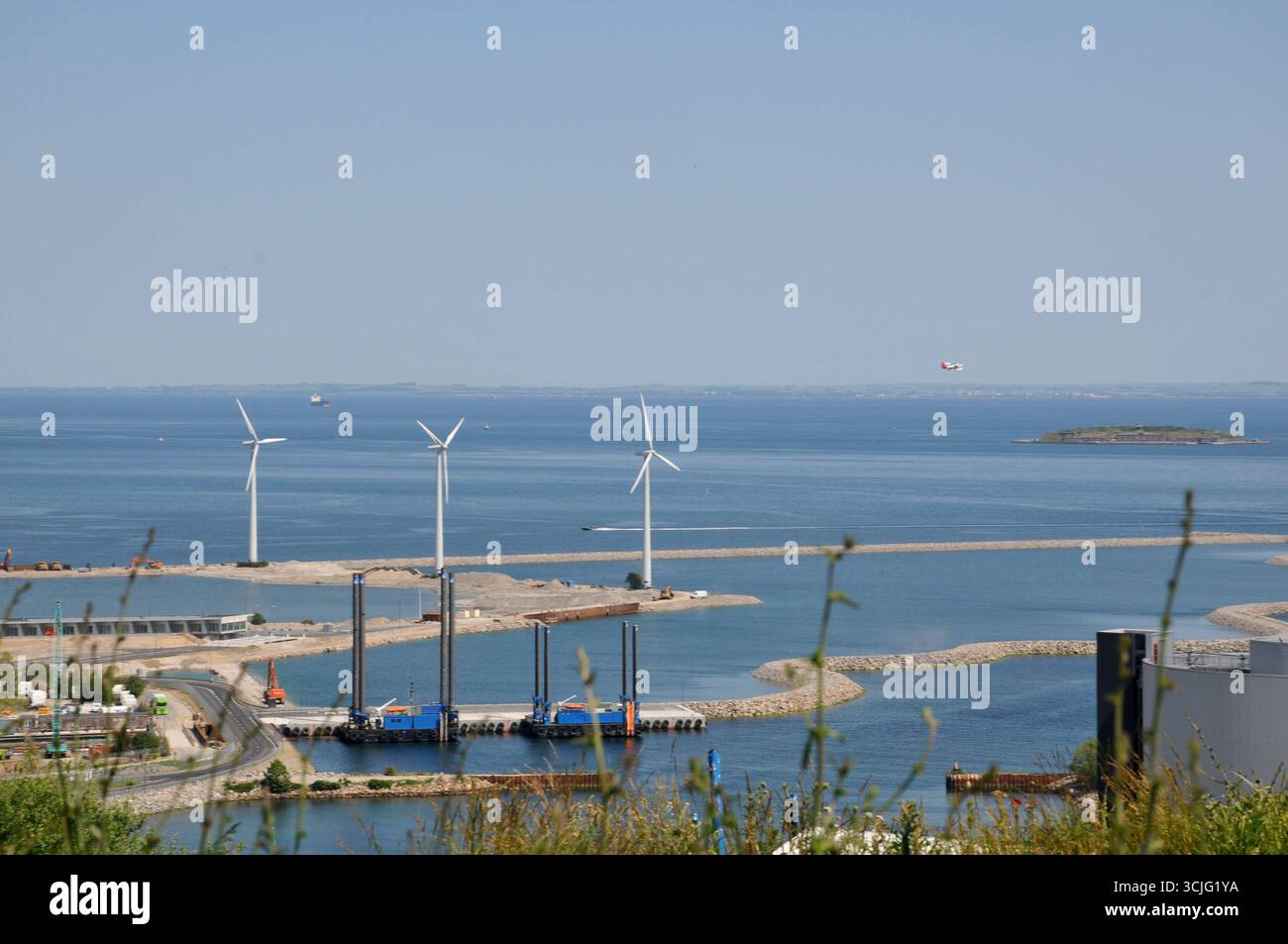 12 june 2023/ Danes and green enry wind tuirbines in danish shore in ...
