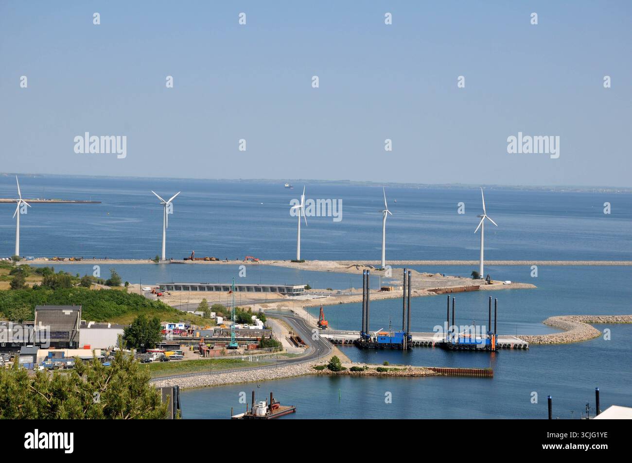12 june 2023/ Danes and green enry wind tuirbines in danish shore in ...