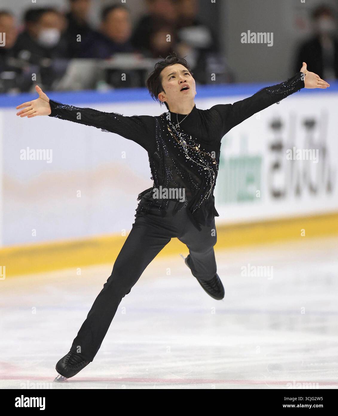 Kazuki TOMONO of Japan performs during the Men's Singles free skating ...