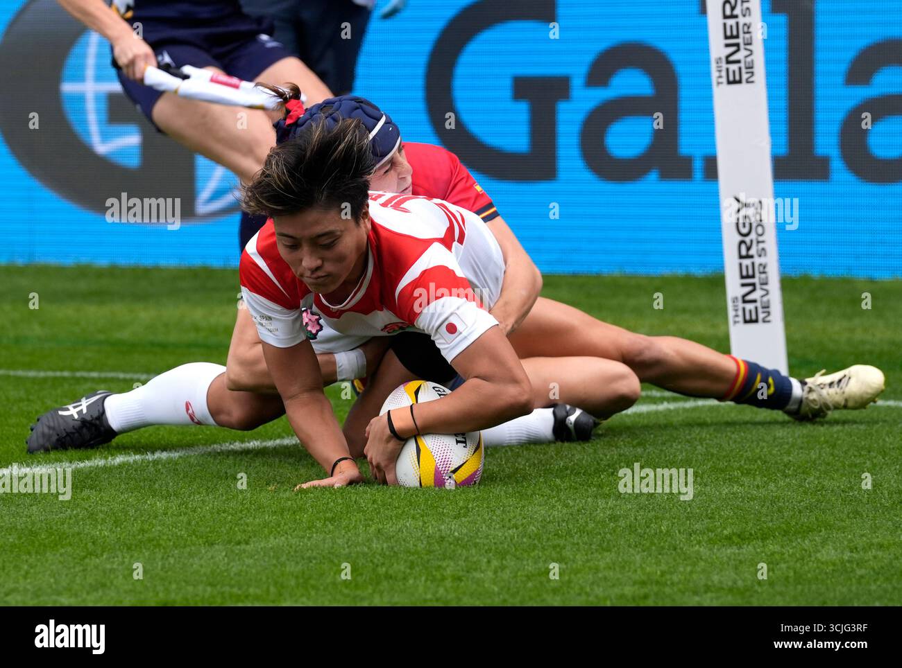 Japan's Sora Nishimura scores their side's first try of the game during ...