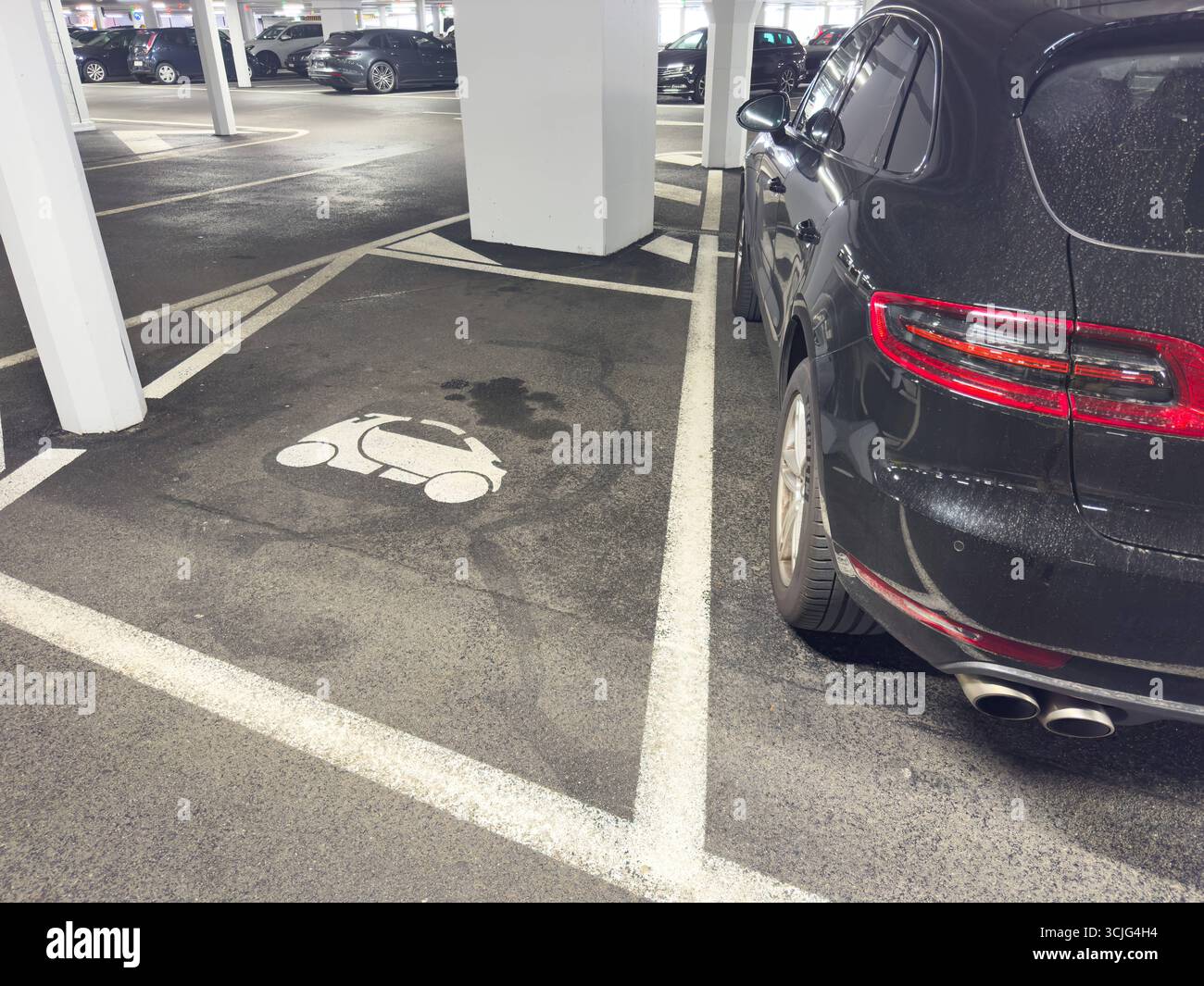 Parking lot for a small car at a supermarket in Zurich, Switzerland ...
