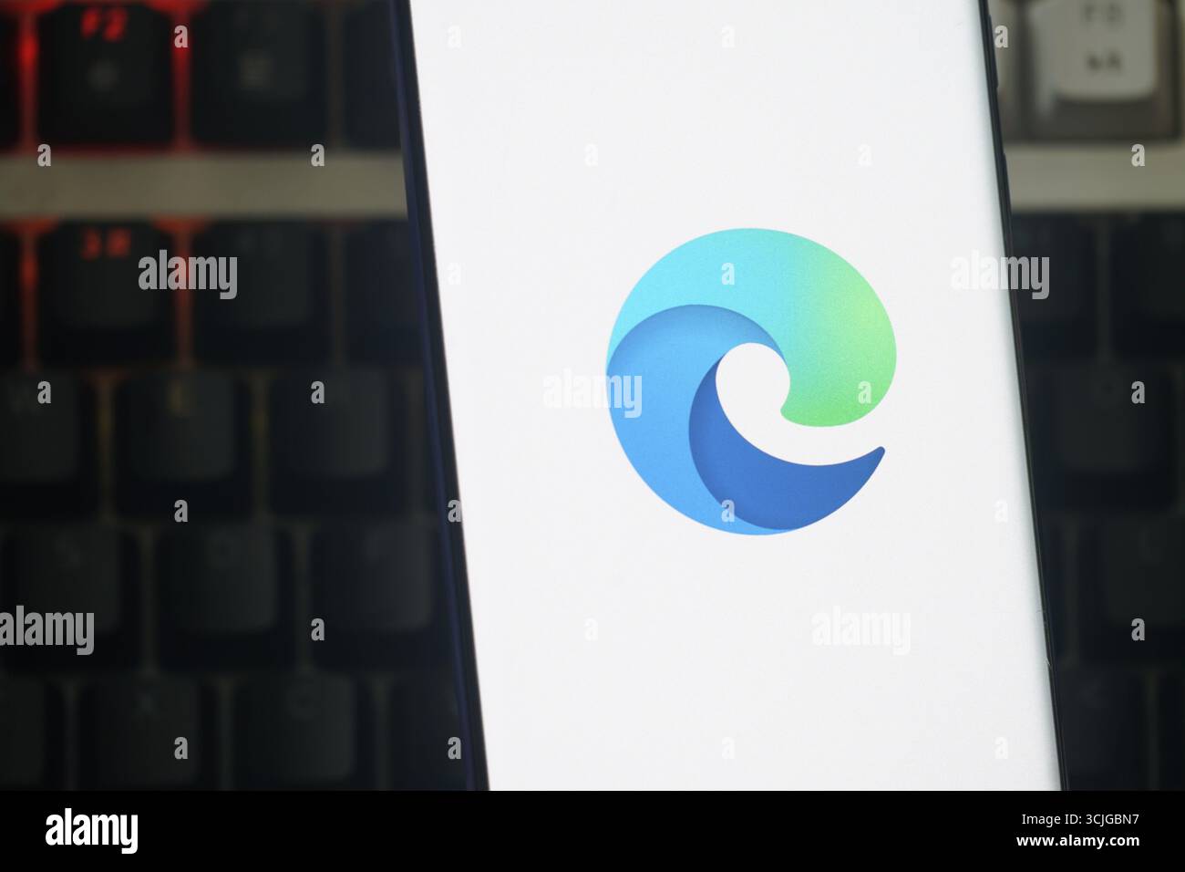 Edge browser logo in blue and green with a wave design on a smartphone ...