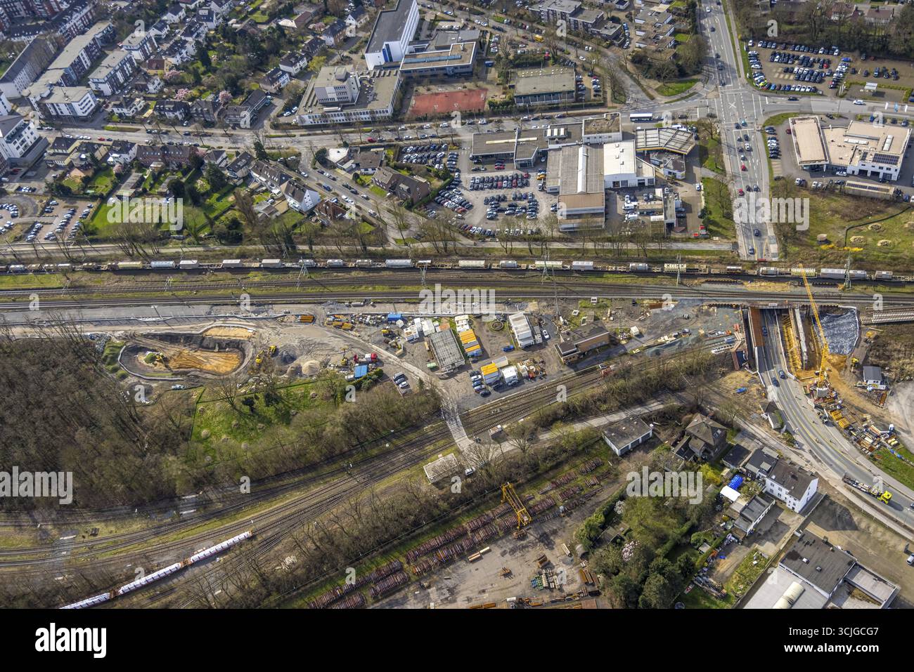 Aerial view, construction site railway line with goods train at the ...