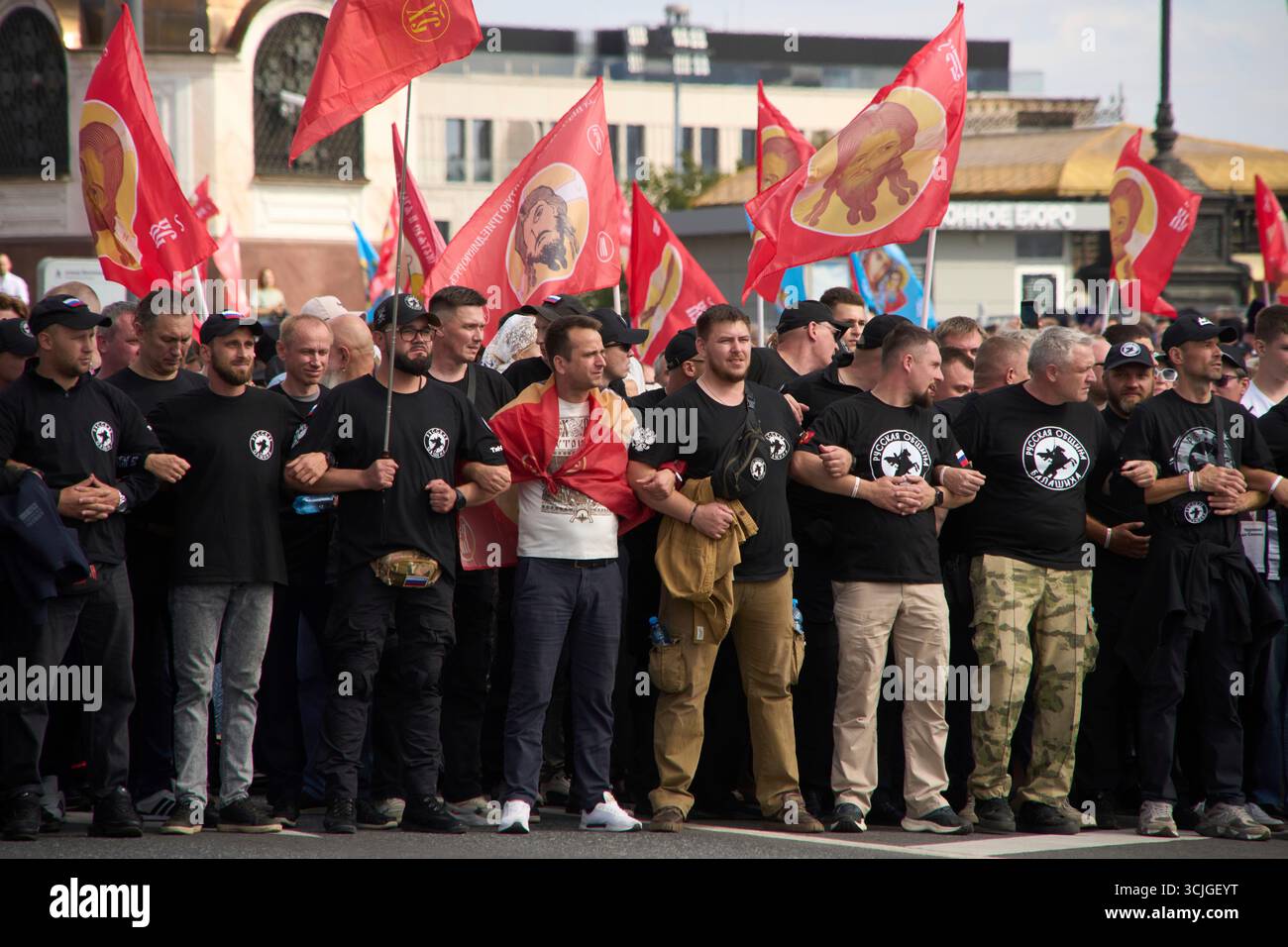 Russian Orthodox Church believers stand waiting to take part in a ...
