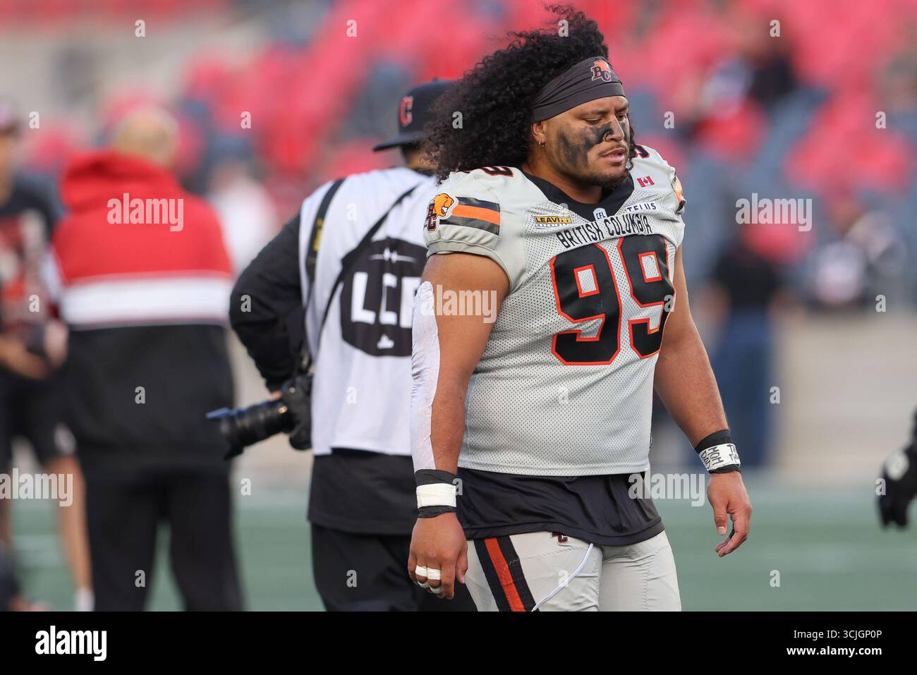 September 05, 2025: BC Lions defensive lineman Jonah Tavai (99) warms ...