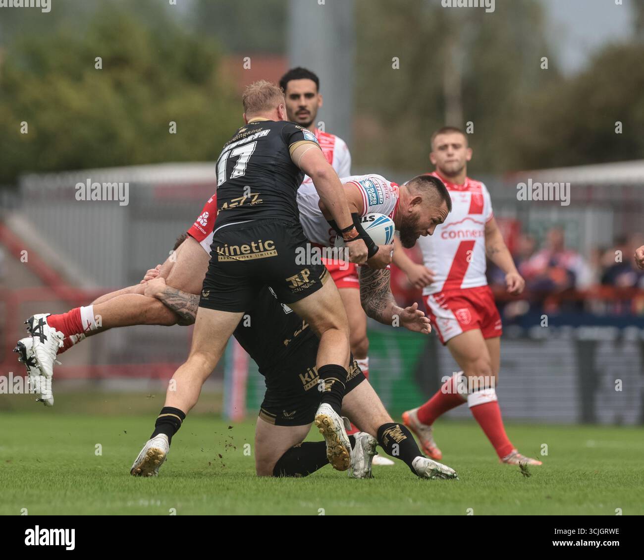 Jared Waerea-Hargreaves of Hull KR is tackled by Jack Ashworth of Hull ...