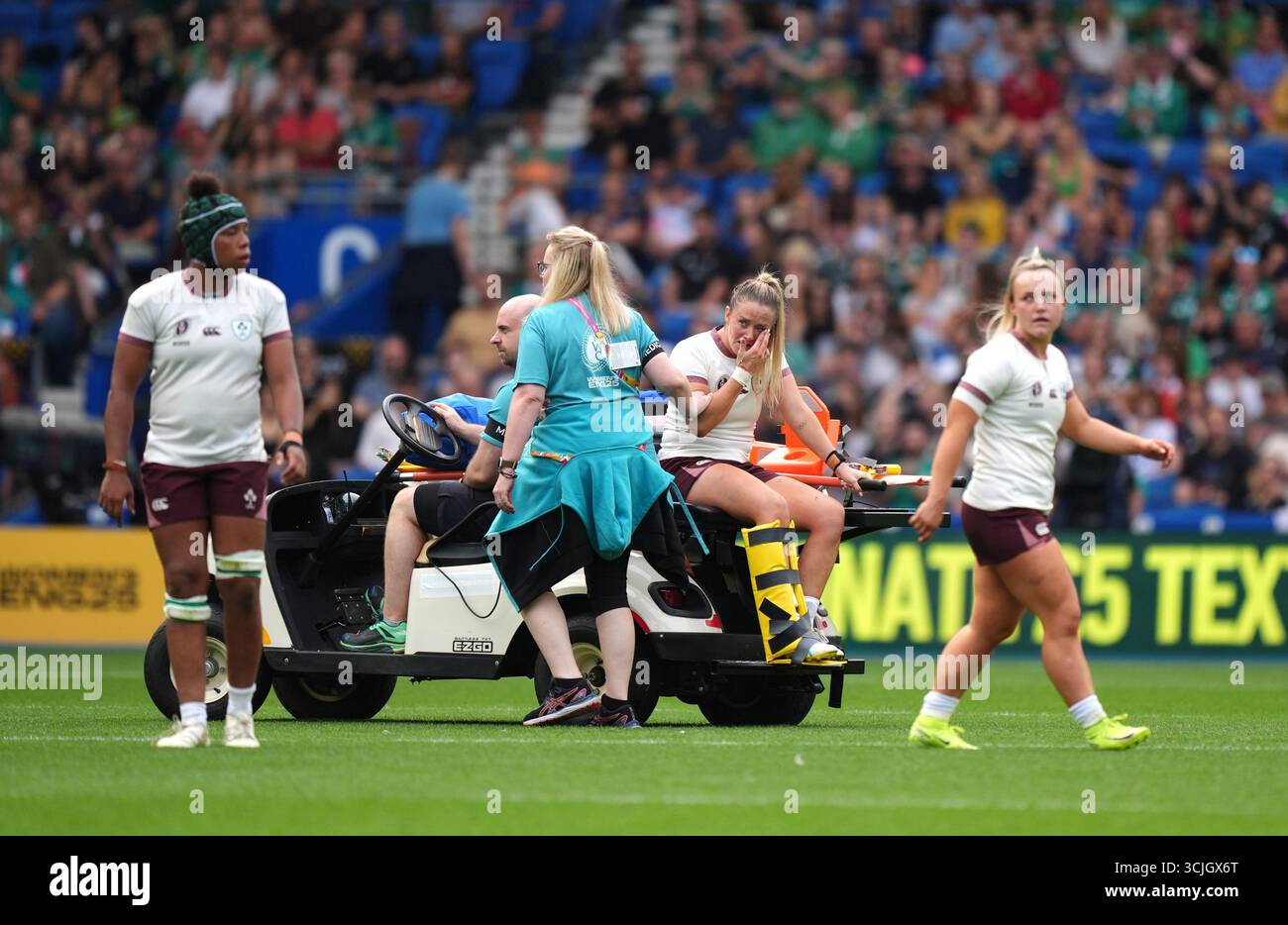 Ireland's Stacey Flood leaves the field after sustaining an injury ...