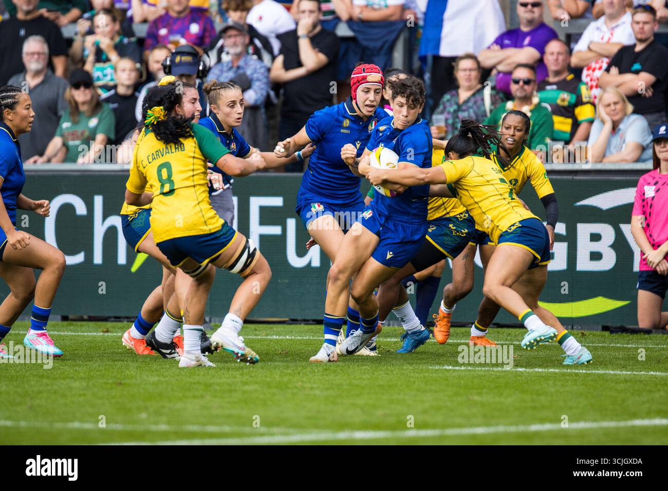 Aura Muzzo (Wing – Italy and Lyon OU) tries to dart down the wing ...