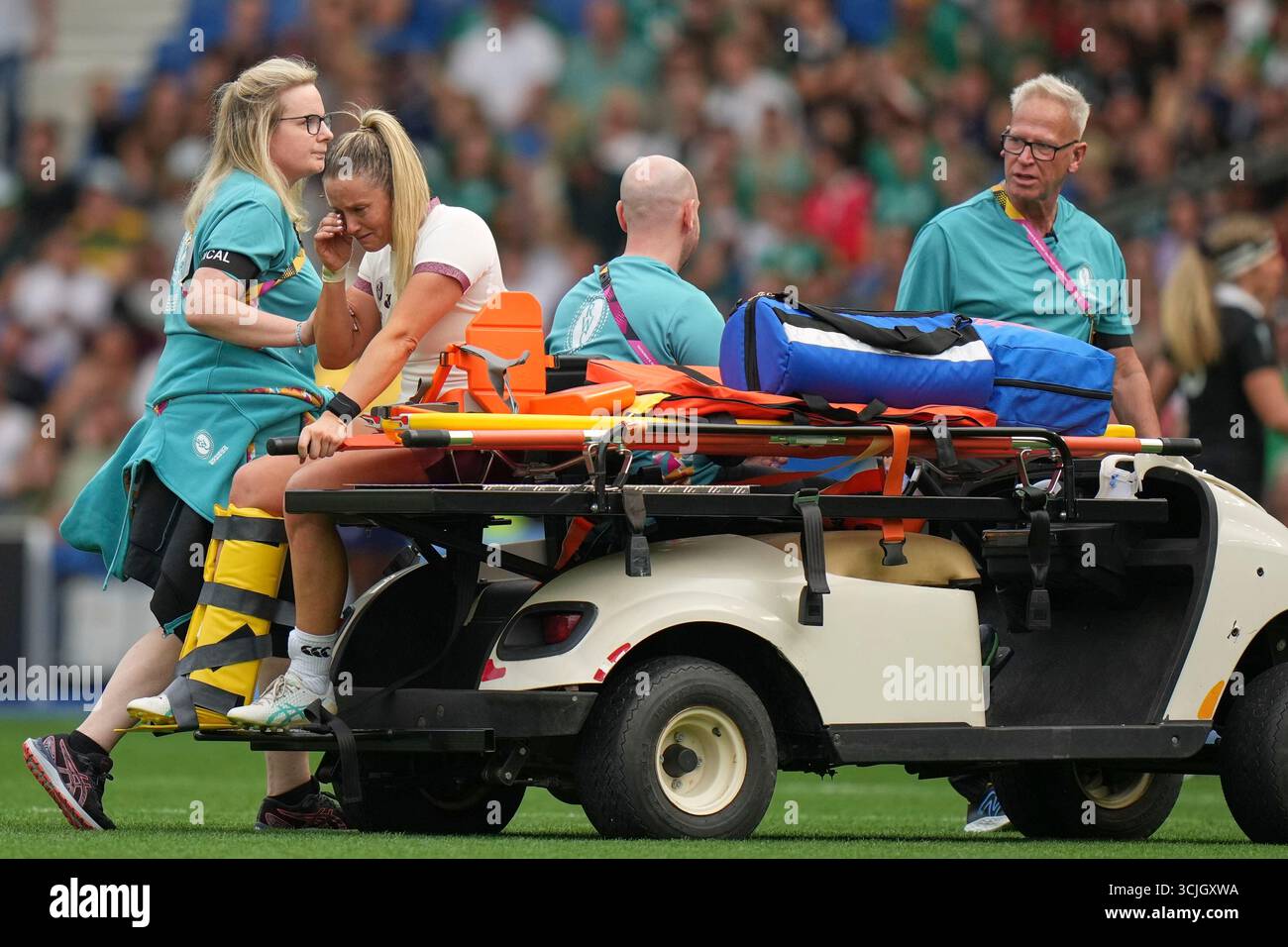 Ireland's Stacey Flood leaves the field after an injury during the ...