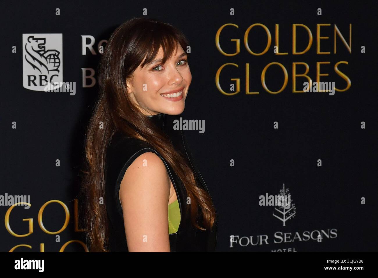 Elizabeth Olsen attends "The Road to the Golden Globes Party at TIFF ...