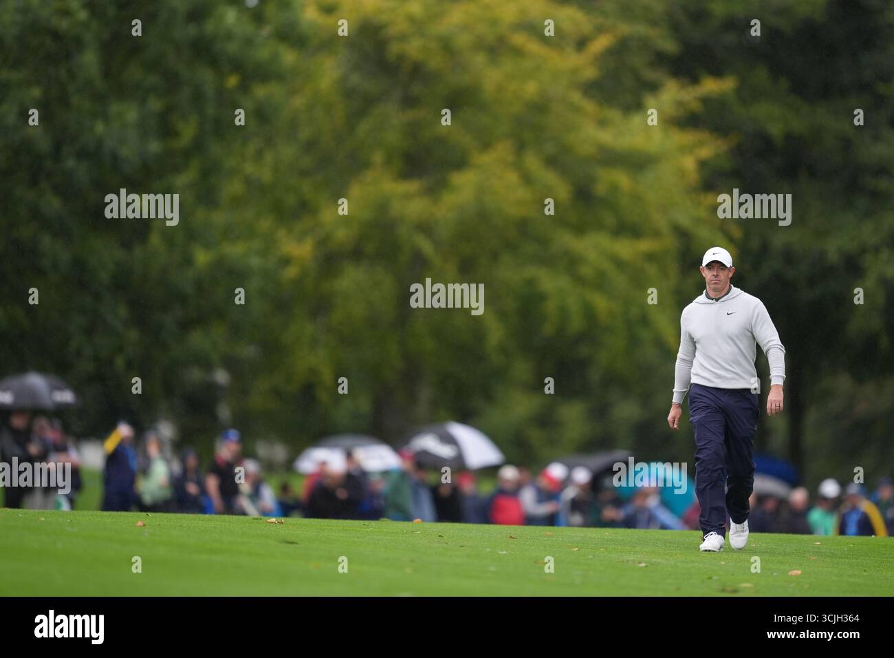 Northern Ireland's Rory McIlroy walks down the 11th fairway on day four ...