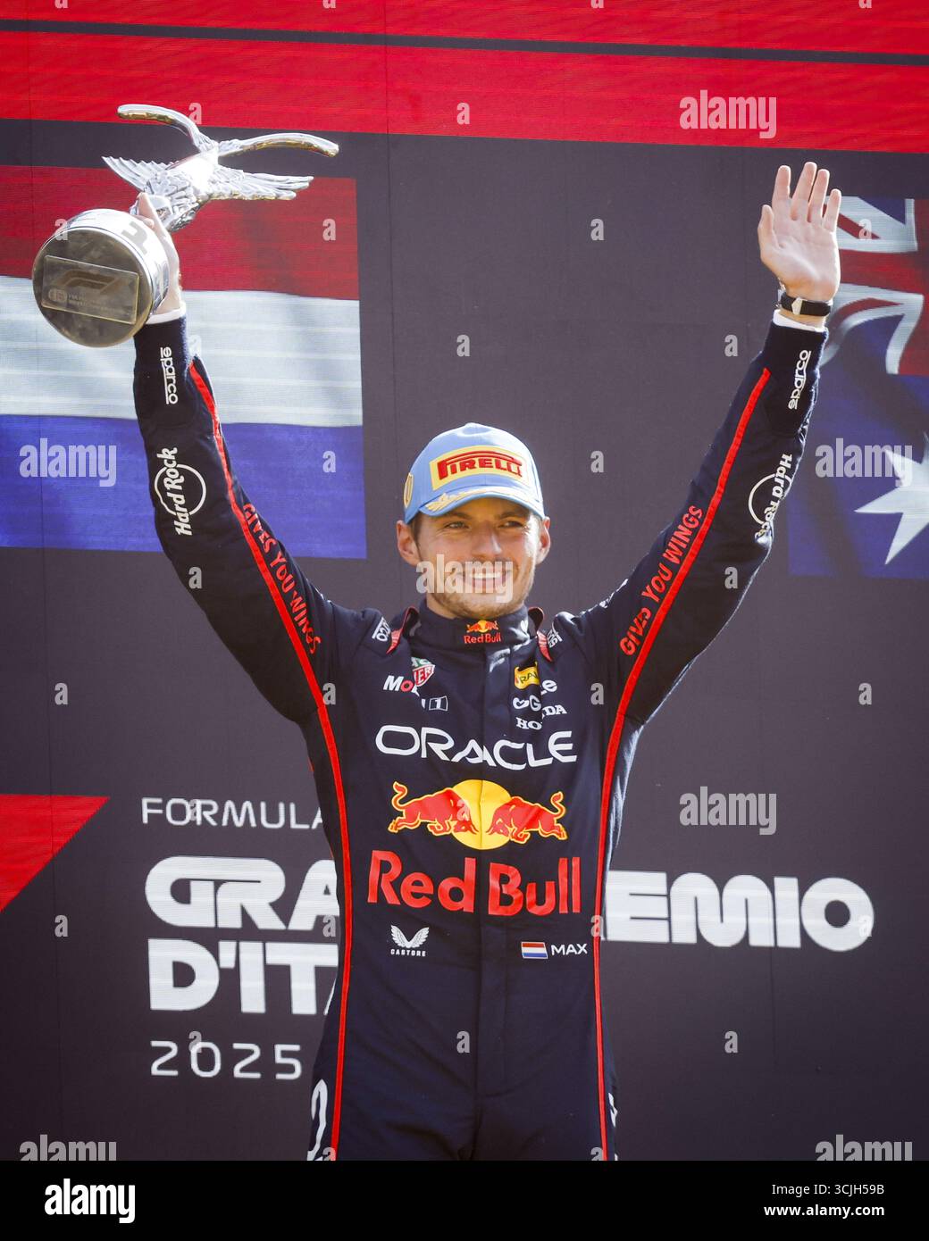 MONZA - Max Verstappen (Red Bull Racing) on the podium with his trophy ...