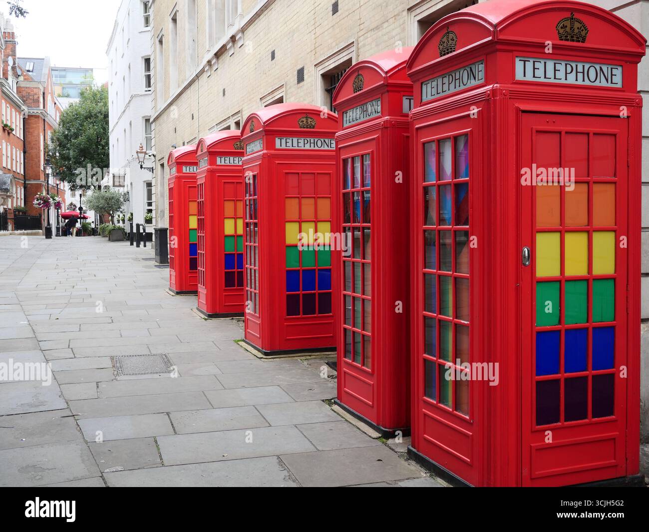 Iconic red telephone boxes displayed with Pride LGBTQ flags and colours ...