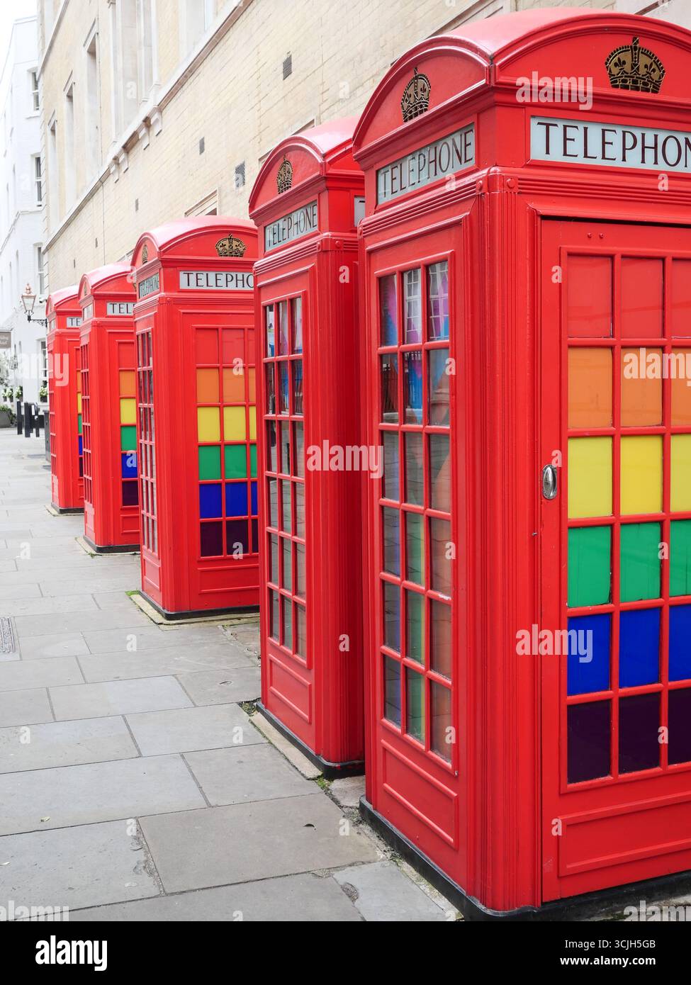 Iconic red telephone boxes displayed with Pride LGBTQ flags and colours ...