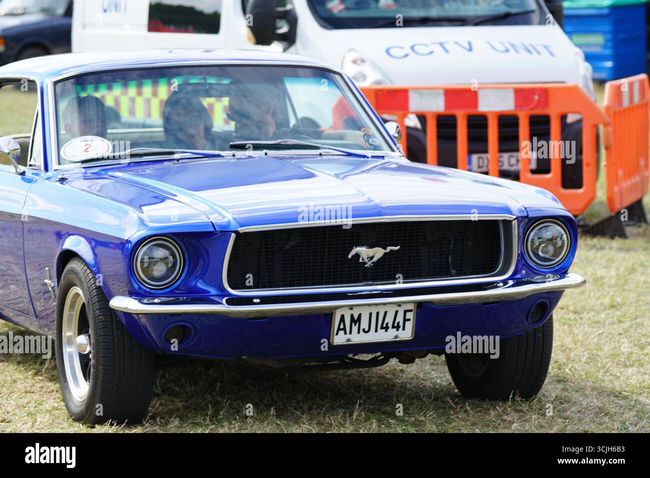 Classic Blue Ford Mustang Car Displayed at Outdoor Event. Shere Hill ...