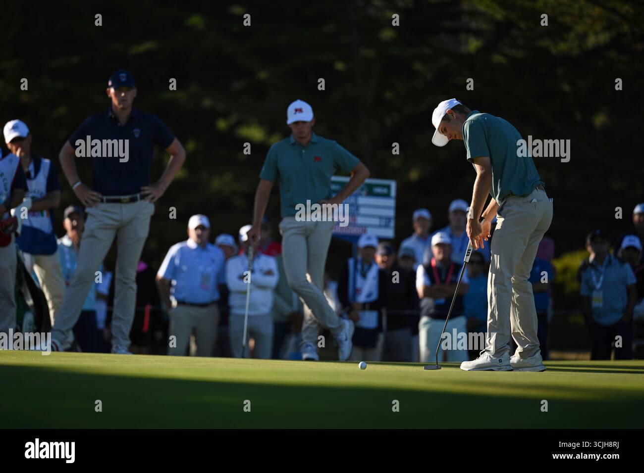 The Great Britain and Ireland team's Connor Graham putts on the third ...