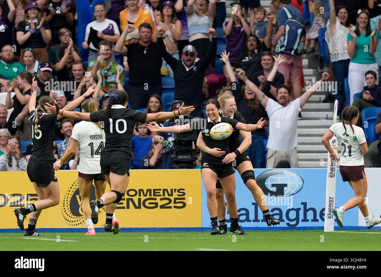 New Zealand's Maia Joseph (centre) celebrates after scoring a try ...