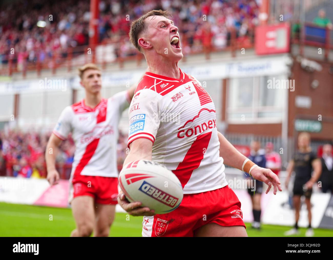 Hull KR's Jack Broadbent celebrates scoring their third try during the ...