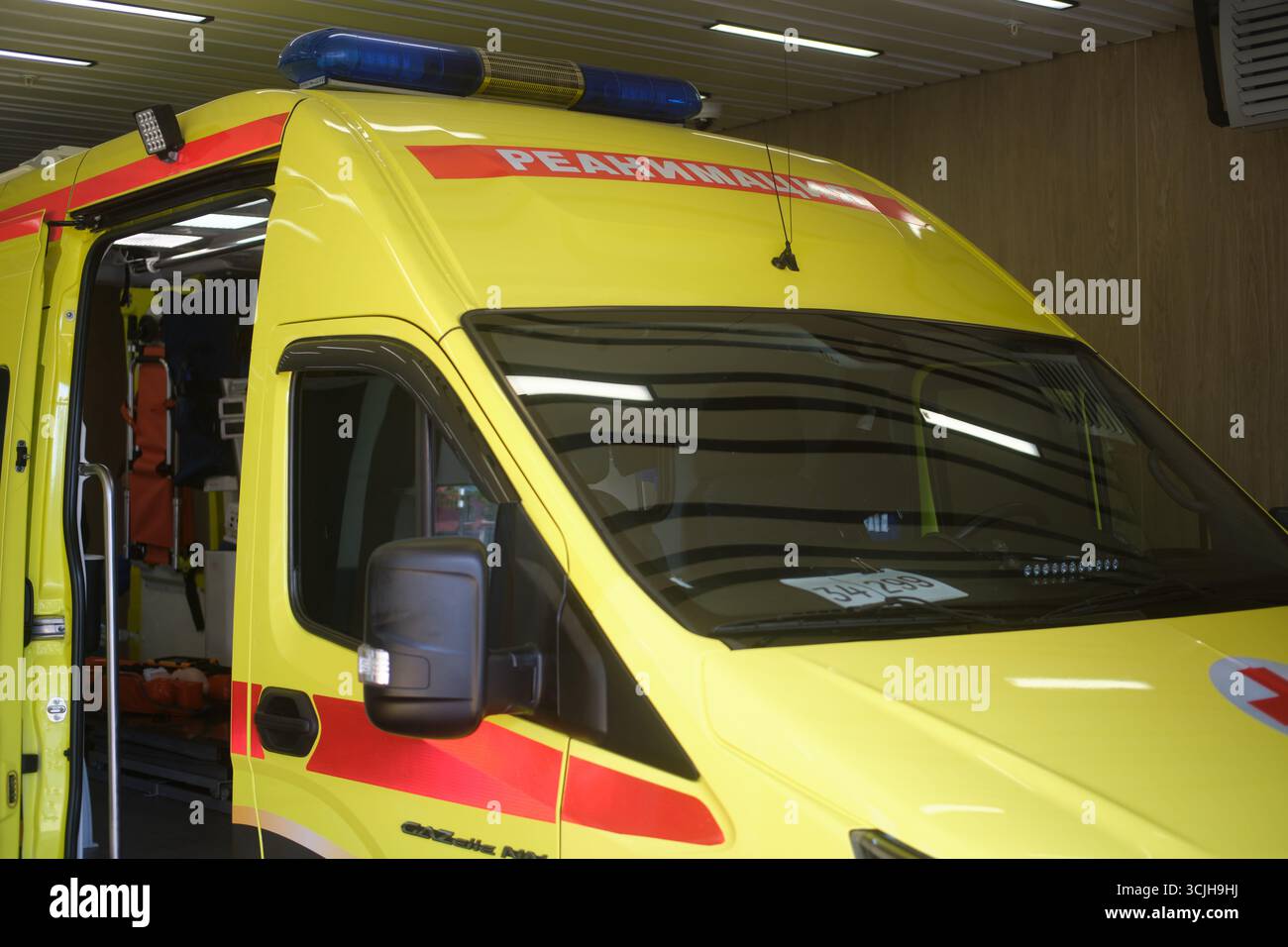 Yellow reanimation ambulance car with opened door. Medical emergency ...