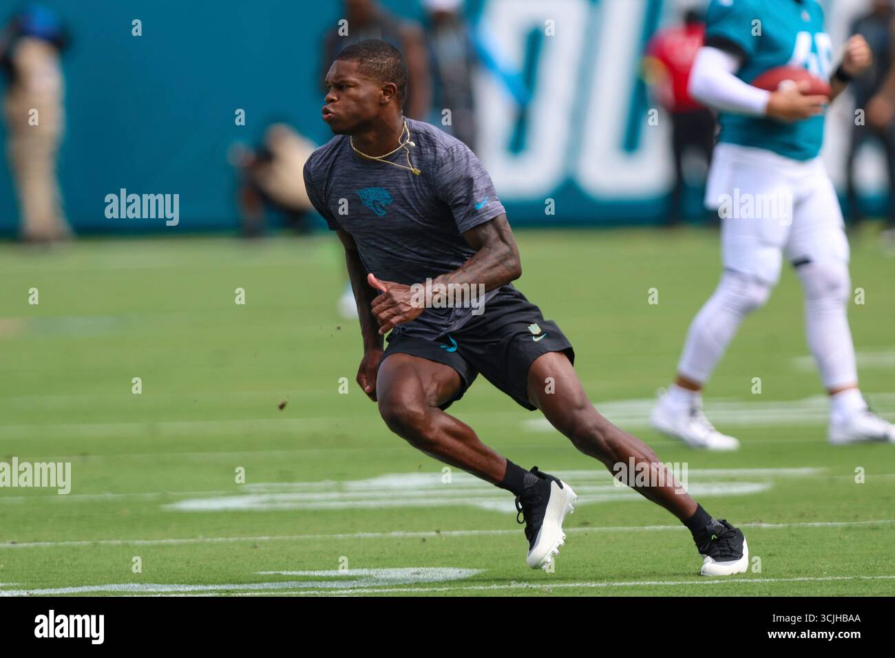 Jacksonville Jaguars' Travis Hunter warms up wearing Anthony Edwards ...