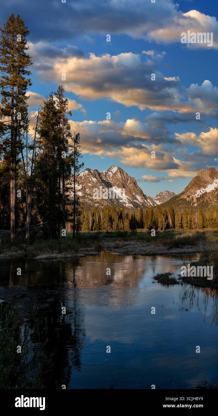 Sawtooth mountain rage sunrise with river reflection Stock Photo - Alamy