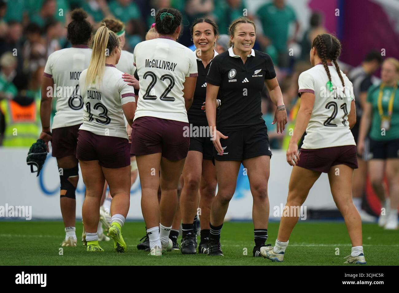 New Zealand's Renee Holmes, second from right, shakes hand with Ireland ...