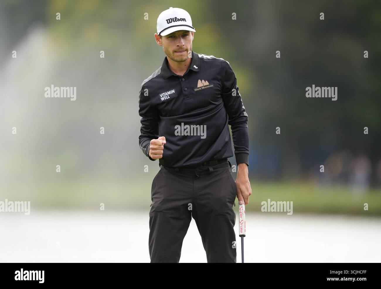 Sweden's Joakim Lagergren celebrates his birdie putt on the 18th on day ...