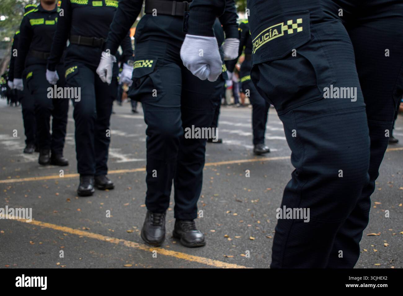 Police unit marching on the street, Colombian police parade, Armed ...