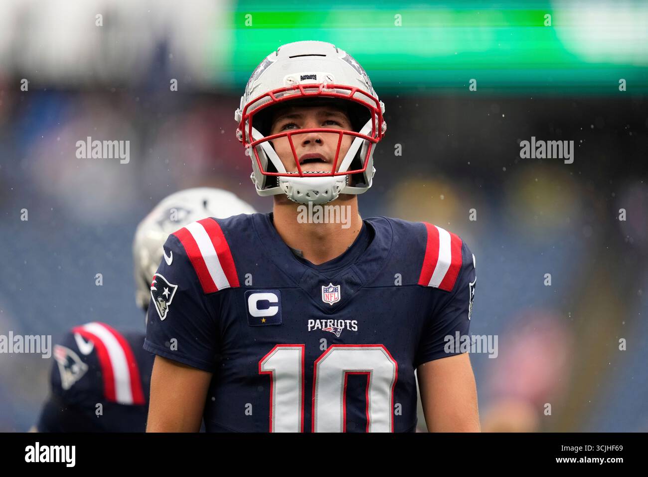 New England Patriots quarterback Drake Maye (10) warms up before an NFL ...