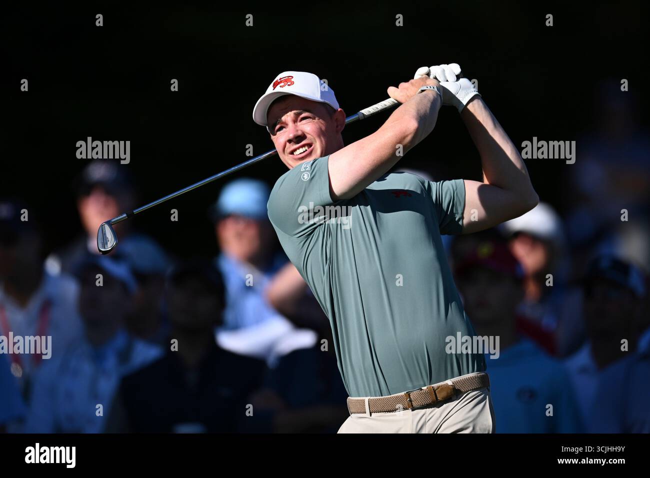 The Great Britain and Ireland team's Stuart Grehan hits from the third tee during Walker Cup ...