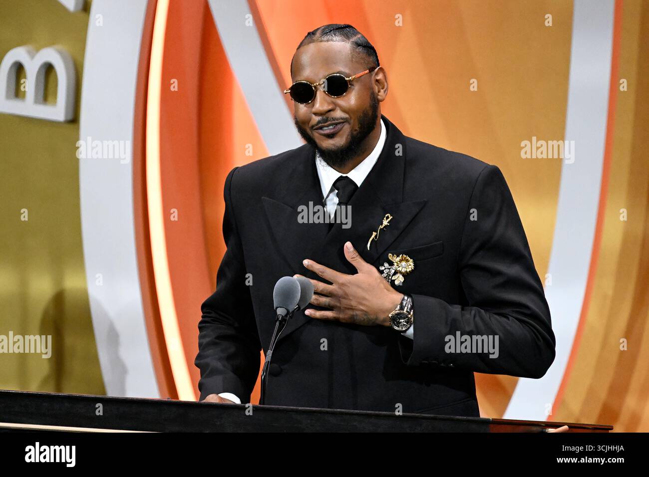 Carmelo Anthony speaks during his enshrinement in the Basketball Hall ...