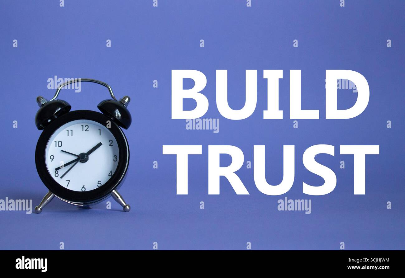 Build trust symbol. Beautiful purple background with alarm clock ...