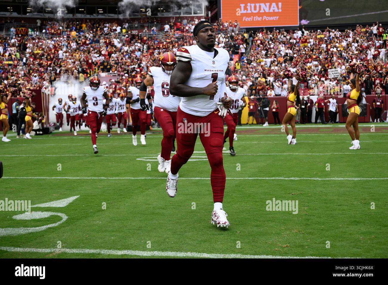 Washington Commanders wide receiver Deebo Samuel (1) and teammates ...