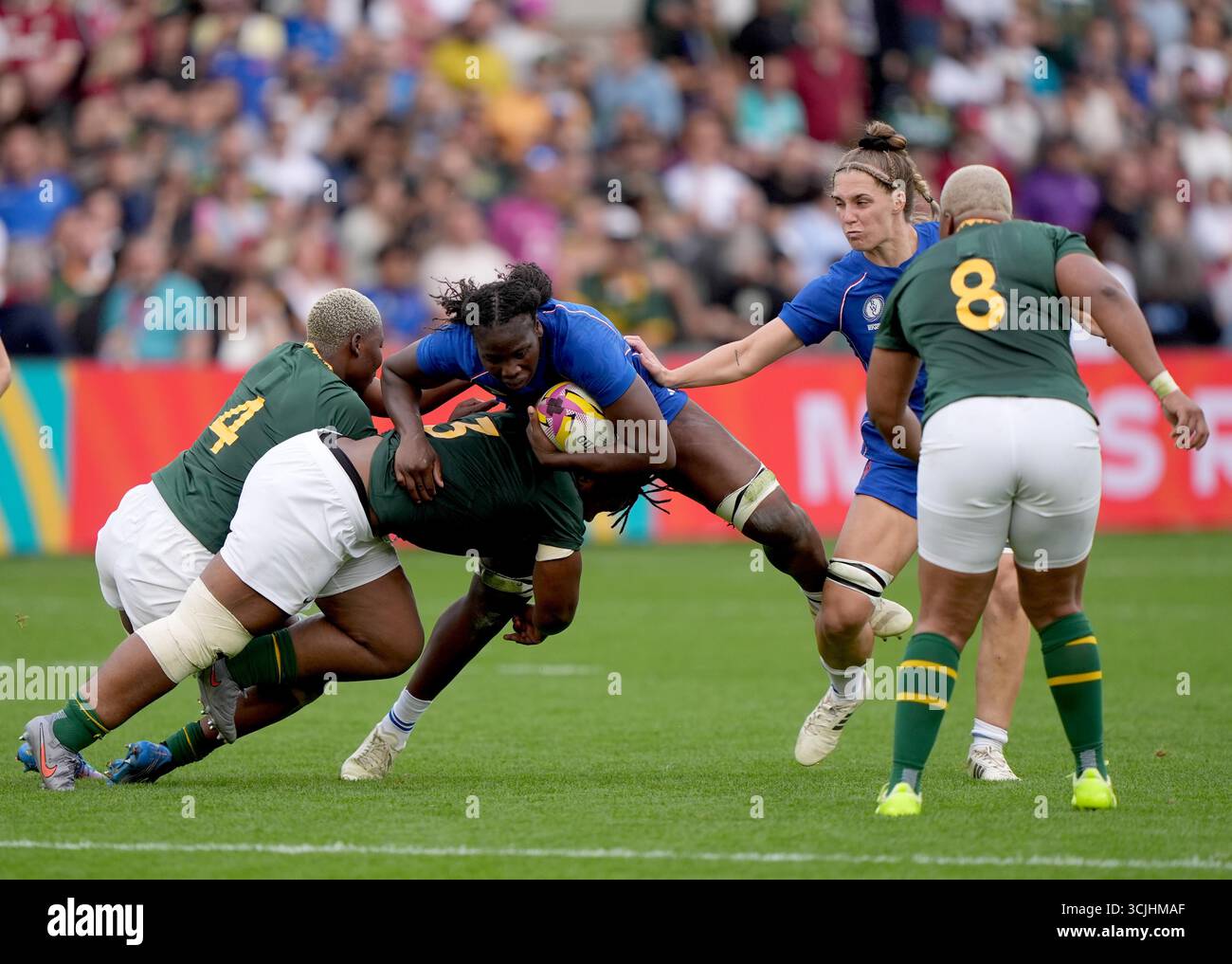 France's Madoussou Fall is tackled by South Africa's Vainah Ubisi and ...