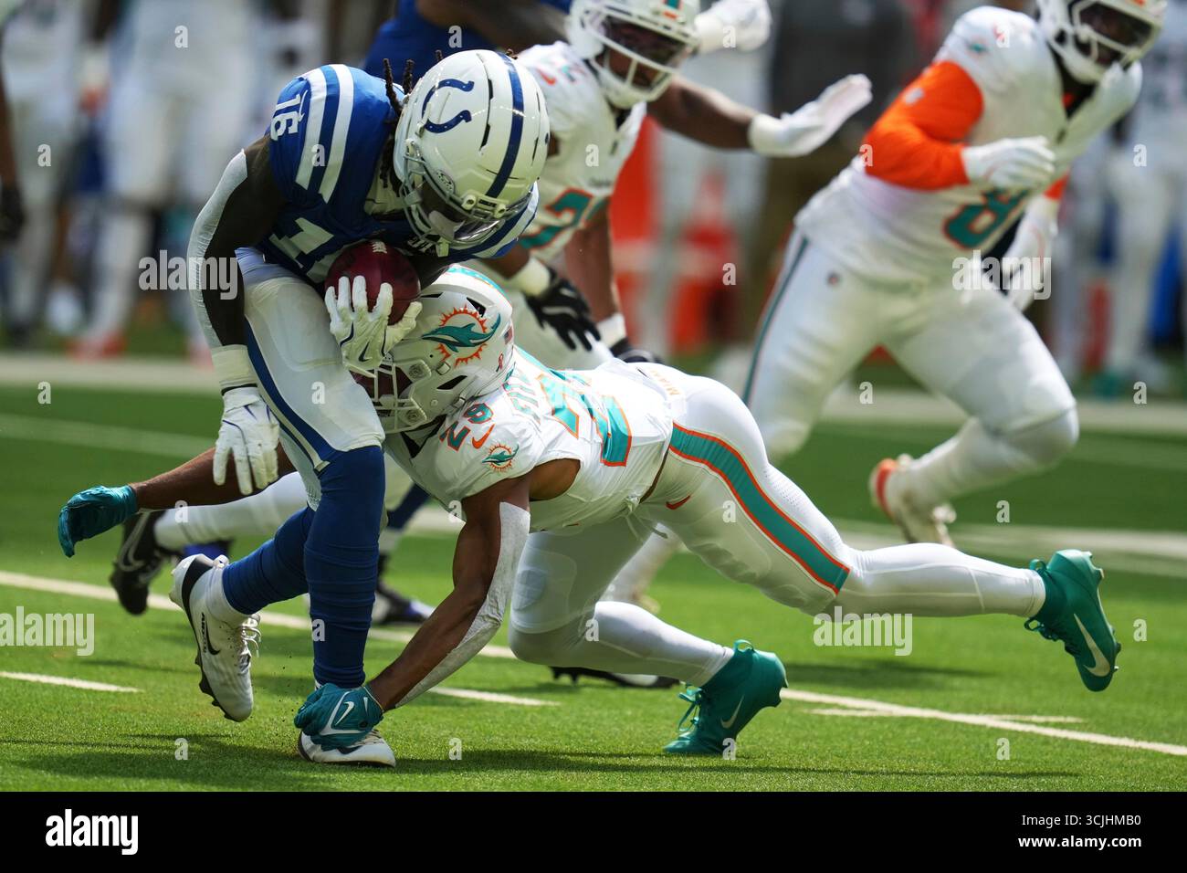 Indianapolis Colts wide receiver Ashton Dulin (16) is tackled by Miami ...