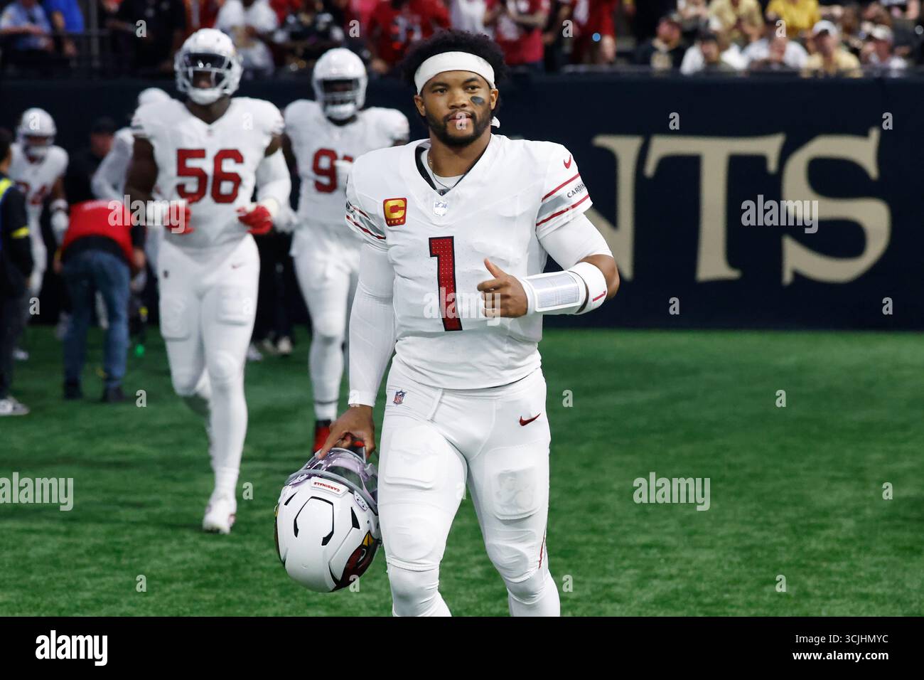 Arizona Cardinals quarterback Kyler Murray runs on the field prior to ...