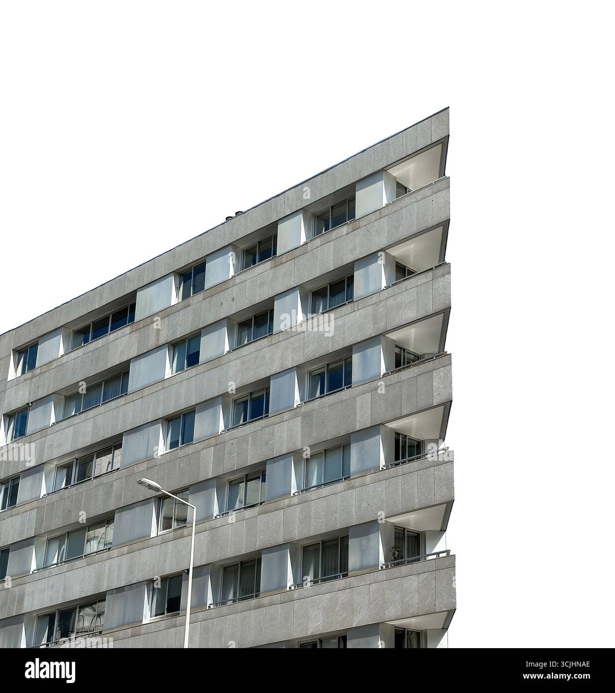 Modern apartment building with minimalist architecture, featuring ...