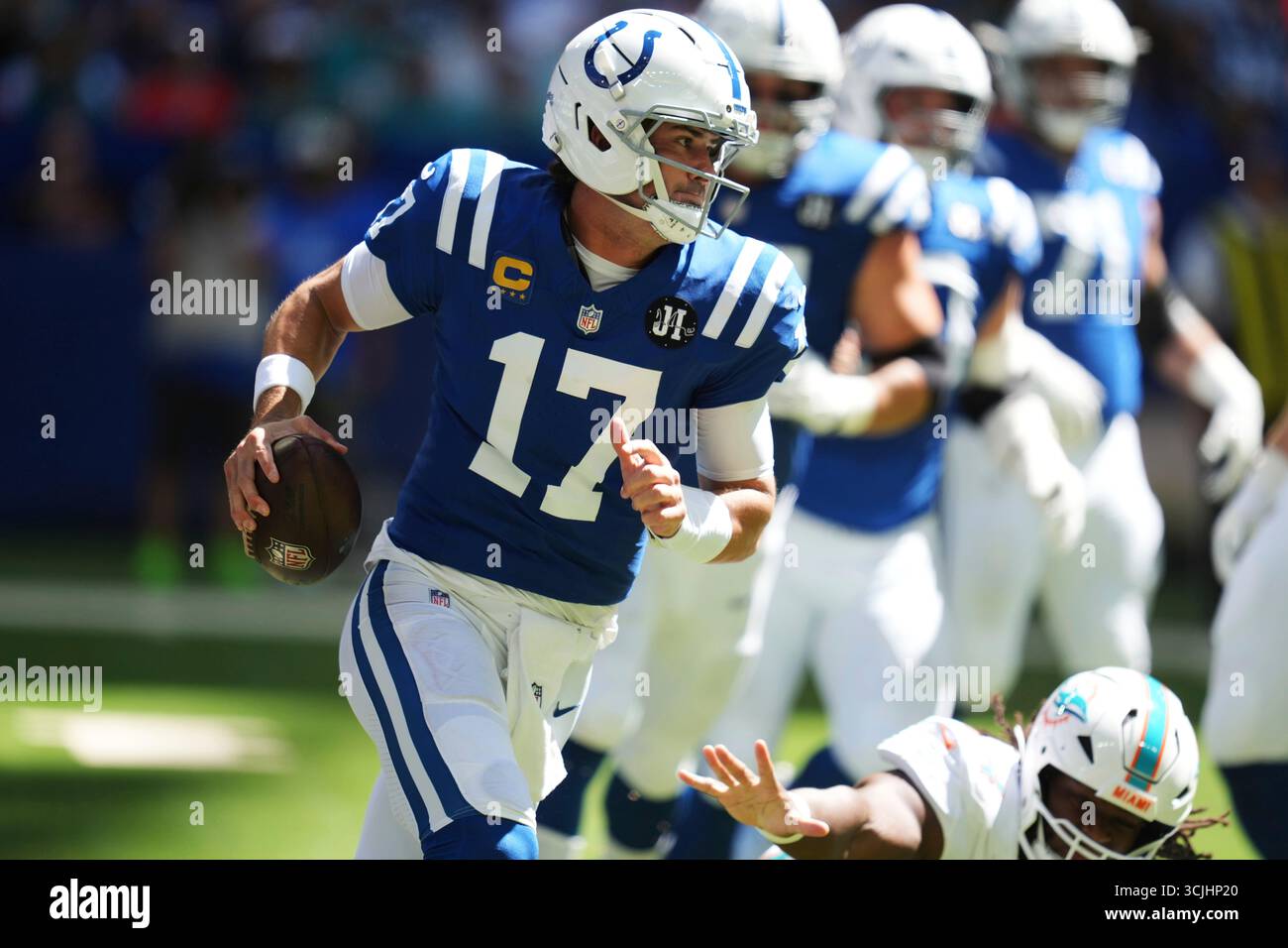 Indianapolis Colts quarterback Daniel Jones (17) runs with the ball ...
