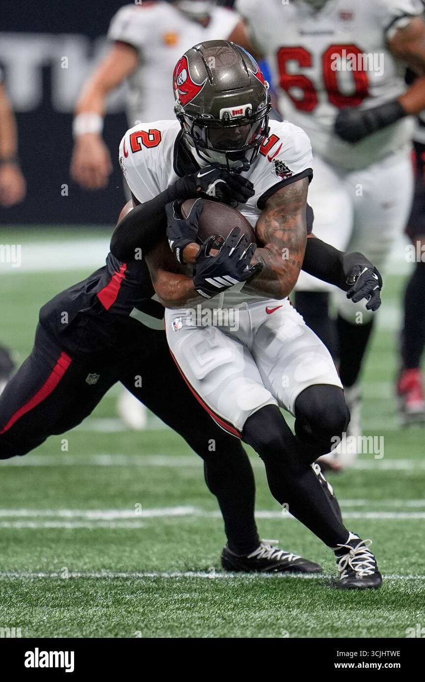 Tampa Bay Buccaneers wide receiver Emeka Egbuka (2) runs the ball ...