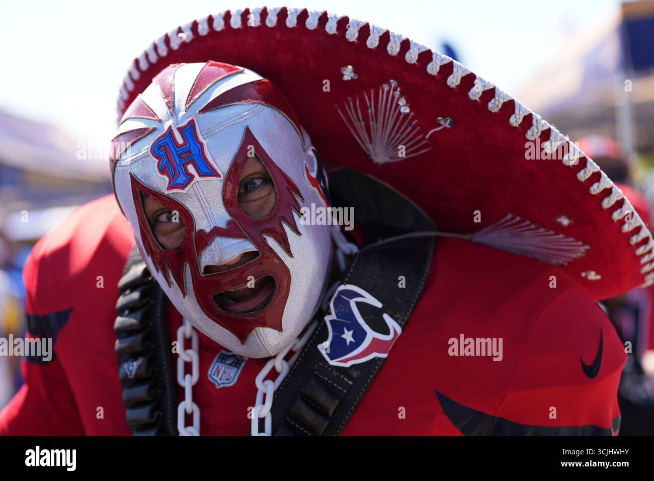 Fans tailgate before an NFL football game between the Los Angeles Rams ...