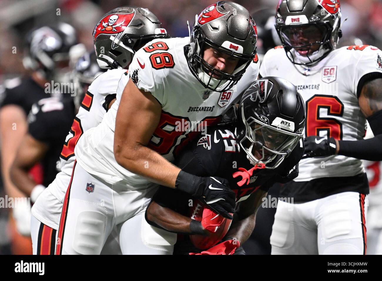 Tampa Bay Buccaneers linebacker Anthony Nelson (98) tackles Atlanta ...