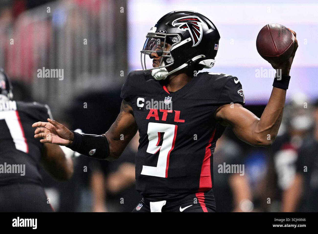 Atlanta Falcons quarterback Michael Penix Jr. (9) sets back to pass during the first half of an ...