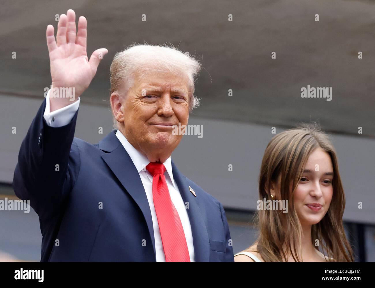 President Donald Trump stands with his granddaughter Arabella Kushner ...