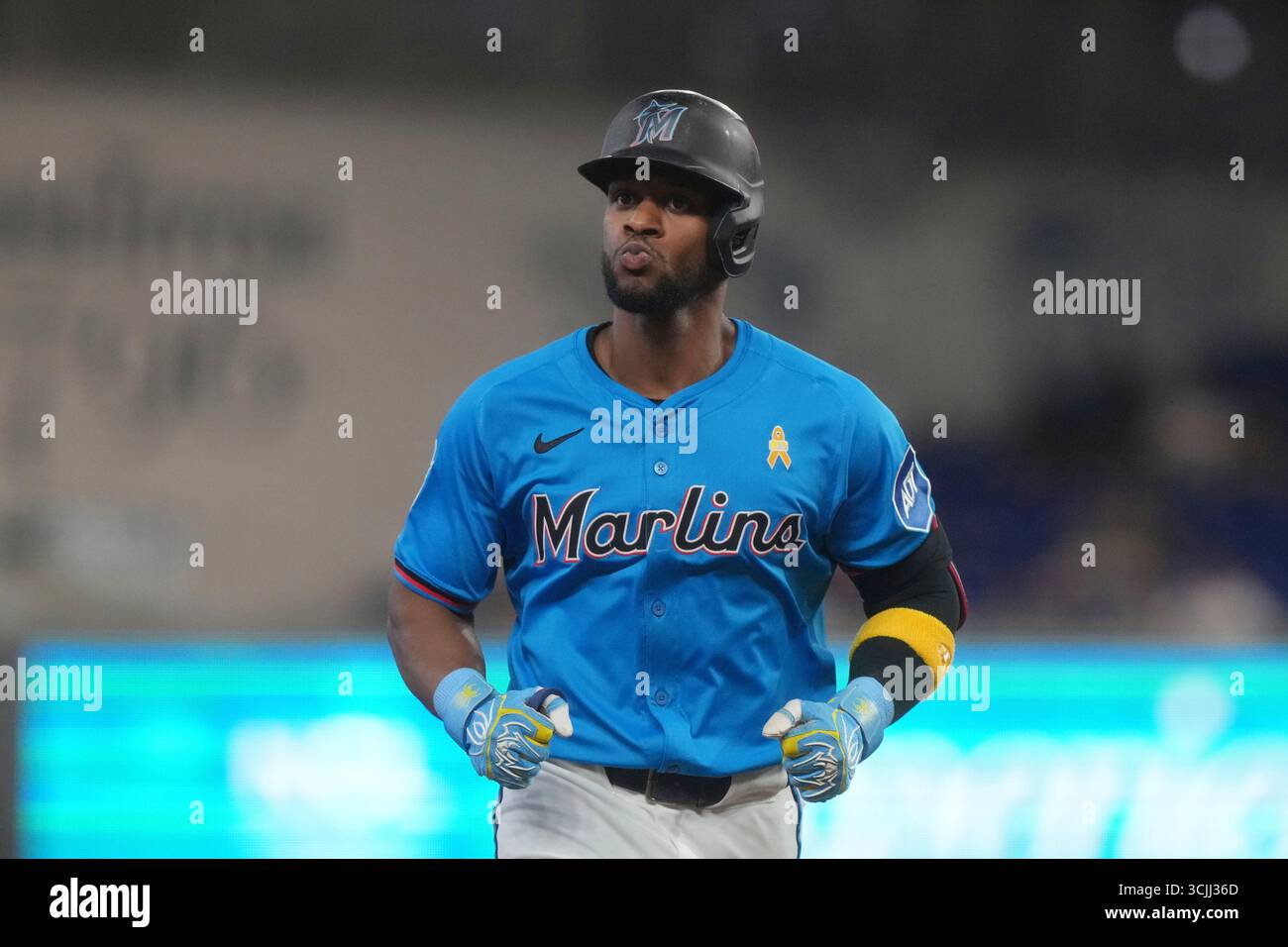 Miami Marlins' Otto Lopez gestures after hitting a three-run home run ...