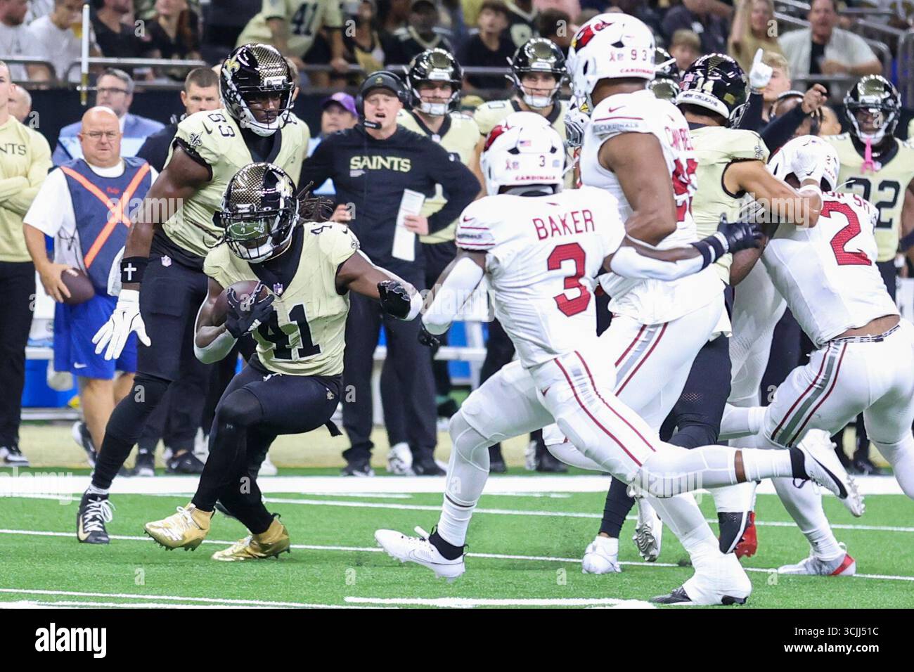 New Orleans Saints running back Alvin Kamara (41) tries get past ...