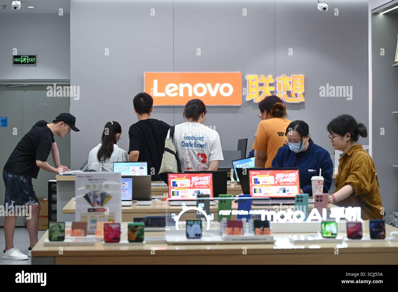 People visiting the Lenovo, a Chinese computer company in the shopping ...