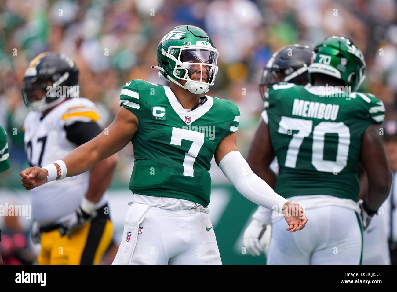 New York Jets quarterback Justin Fields reacts after scoring a ...