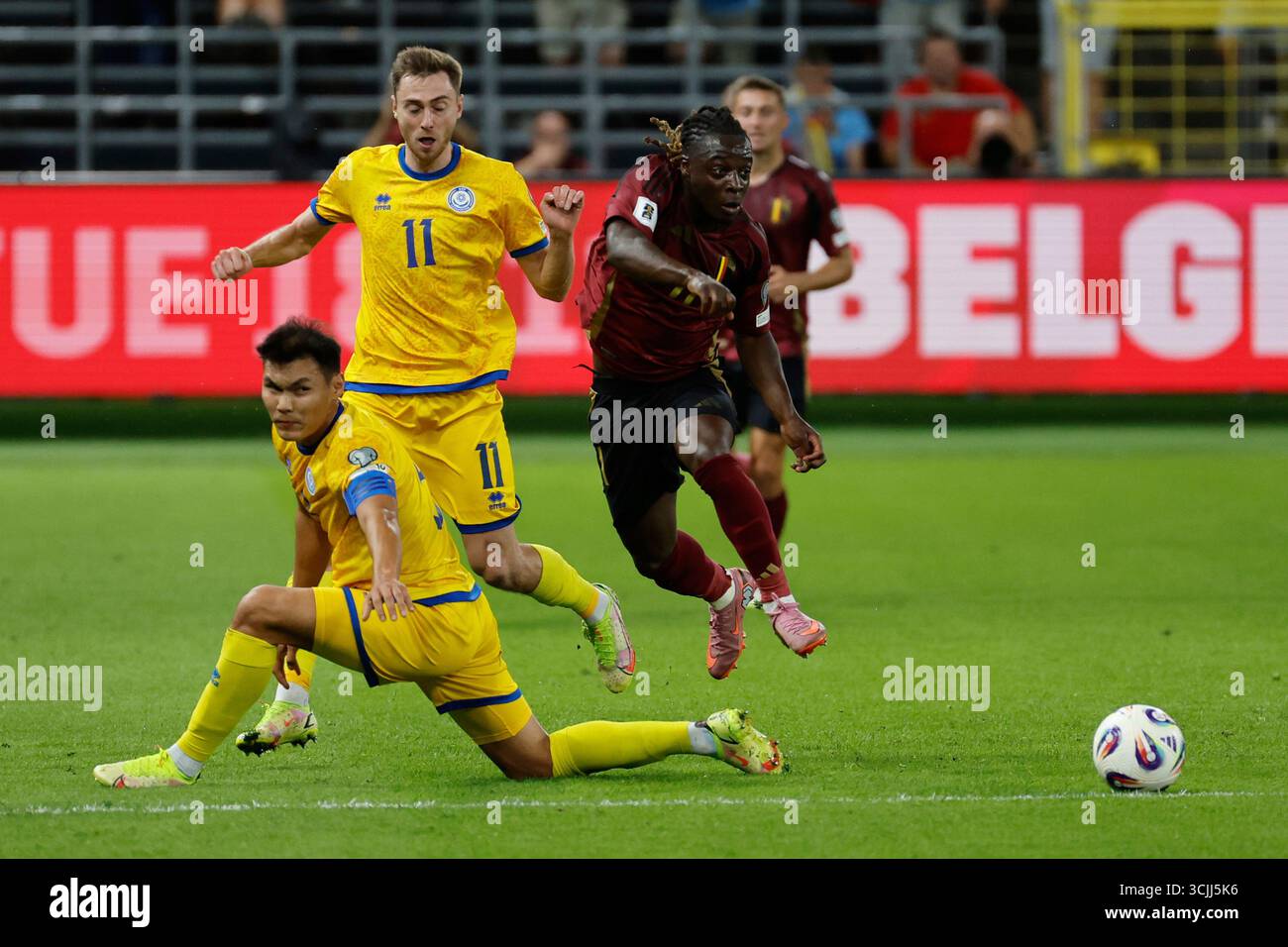 Belgium's Jeremy Doku passes Kazakhstan's Bagdat Kairov during the ...
