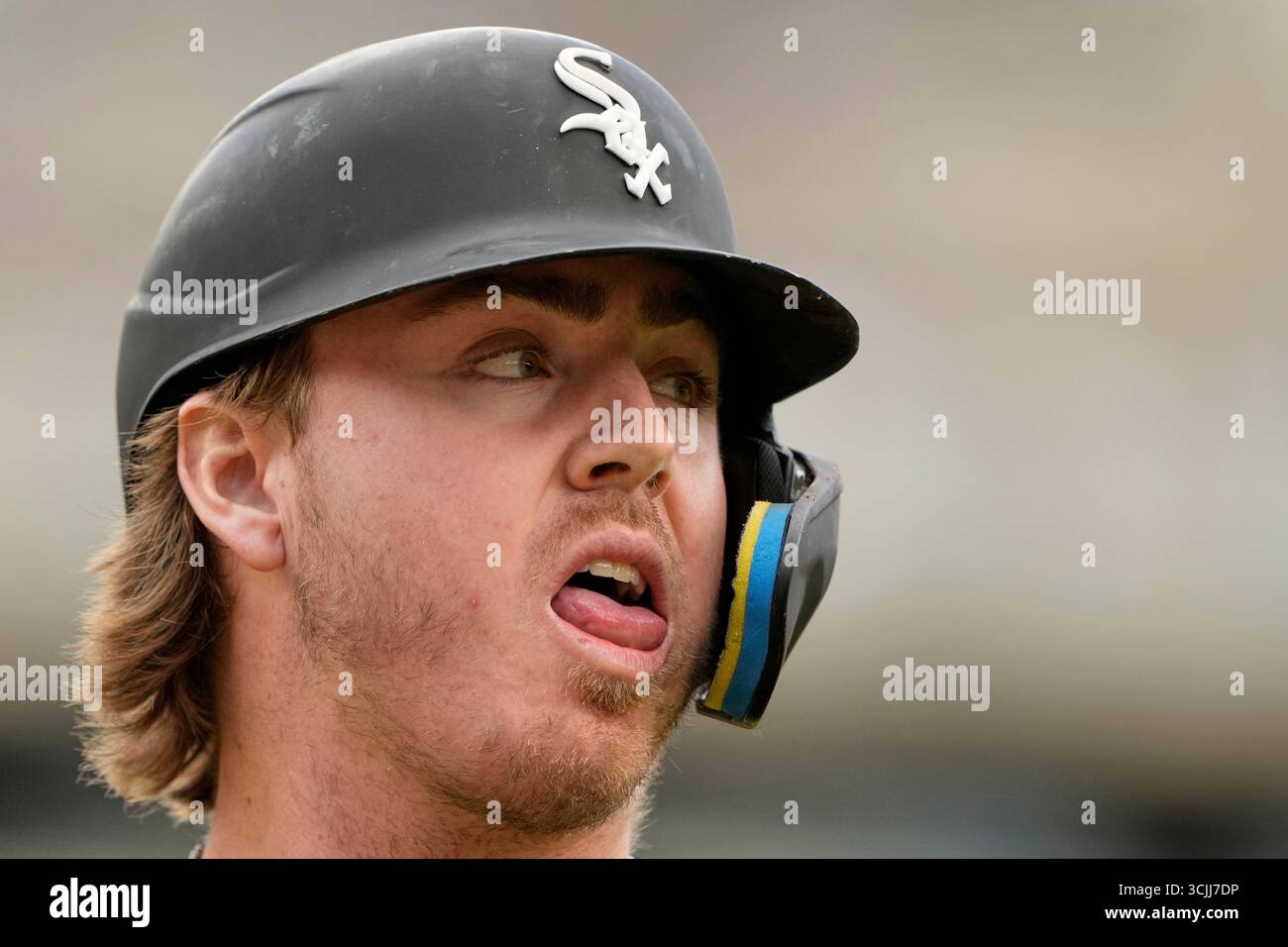 Chicago White Sox's Chase Meidroth reacts while walking back to the ...