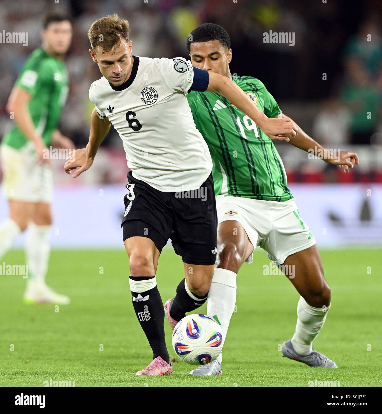 Germany's Joshua Kimmich and Northern Ireland's Shea Charles during the ...